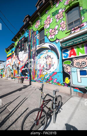 Toronto, Canada, A large art mural in a lateral wall of an apartment ...