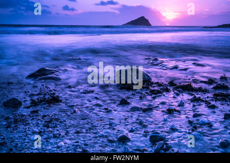 Beautiful dawn light at Wembury Beach with the sea cascading over the ...