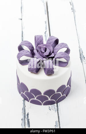 Lilac flowers on a wooden background, macro photography Stock Photo - Alamy