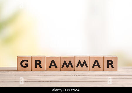 Grammar sign made of wood on a school desk Stock Photo - Alamy