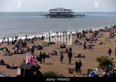 People enjoy the hot sunny weather as the latest heatwave approaches on ...