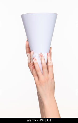 The cone in female hands on white background Stock Photo - Alamy