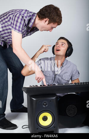 two funny boys with dj booth Stock Photo - Alamy