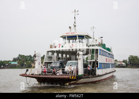Viet-Dan river ferries crossing the Mekong River at An Hoa near Long ...
