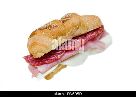 Cornetto savory filling with salami on wooden table seen from above ...
