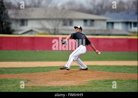 Youth baseball pitcher in wind up Stock Photo - Alamy