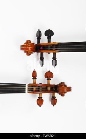 Two violin scrolls Stock Photo - Alamy