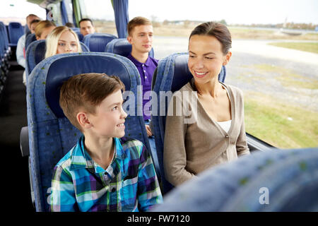 happy family riding in travel bus Stock Photo - Alamy