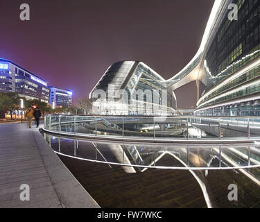 View of multi-level landscaping with linking bridge and exterior ...