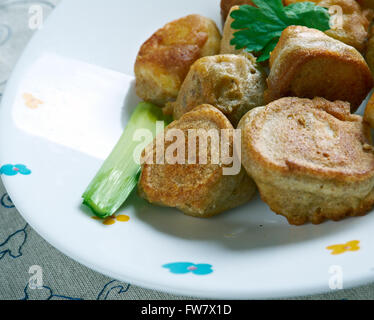 Stamp and Go - fish fritter made with salt fish in Jamaican cuisine ...