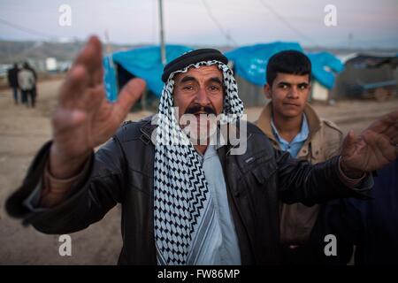 refugee men in Arbat refugee camp in Northern Iraq Stock Photo - Alamy