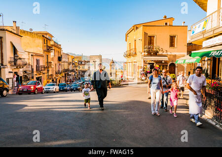 The lively streets of Taormina in summer sundown. Taormina, Messina ...