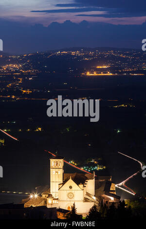 Assisi Basilica by night in Umbria region, Italy. The town is famous ...