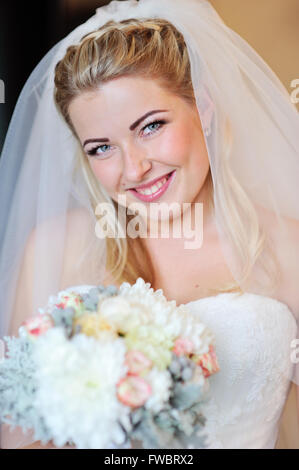 Bride holding a beautiful wedding bouquet during beautiful wedding ...