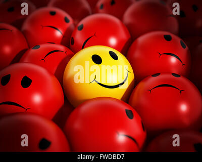 Yellow smiling face stands out against red spheres Stock Photo - Alamy