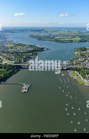 An aerial view of the Tamar Estuary with the road and railway bridges ...