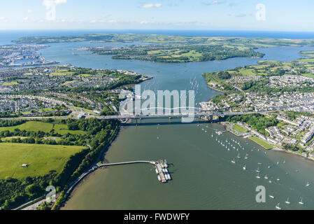 An aerial view of the Tamar Estuary with the road and railway bridges ...