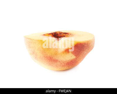 Cut open nectarine half isolated Stock Photo - Alamy