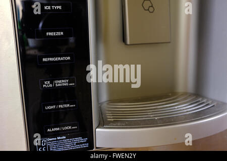 Different function buttons on a modern fridge Stock Photo - Alamy
