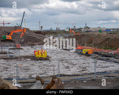 Construction of a new road layout with a digger and coned off area of ...