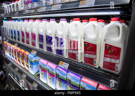 The dairy and milk case at a grocery store Stock Photo - Alamy