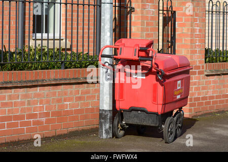 Royal Mail delivery trolley locked or secured on lamppost in Cheshire ...