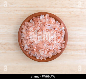 Himalayan pink salt on top of a rock. Selective focus Stock Photo - Alamy