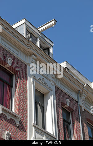 Hook at the top of a building in Amsterdam, used to get large and heavy ...
