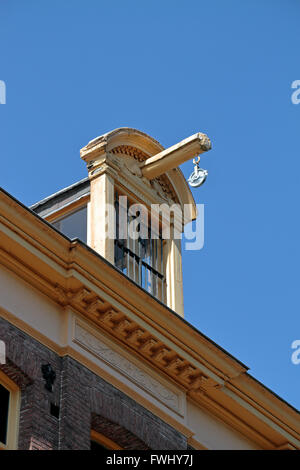 Hook at the top of a building in Amsterdam, used to get large and heavy ...