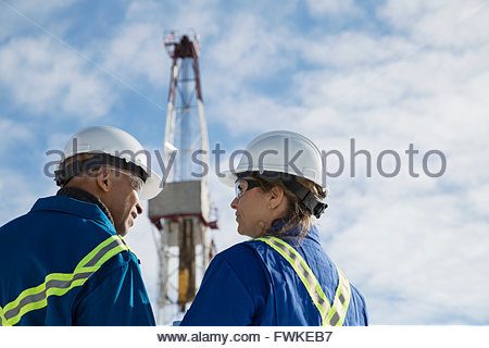 Workers talking on oil rig Stock Photo: 38718581 - Alamy