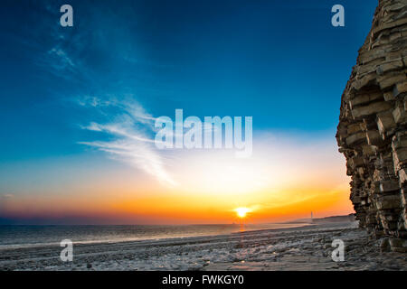 A Sunset, at Rhoose Point, Wales, Rocky Beach Stock Photo - Alamy