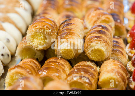 Homemade puff pastry stuffed with cream Stock Photo - Alamy
