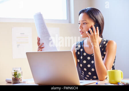 business people discussing the terms of the contract sitting at the ...