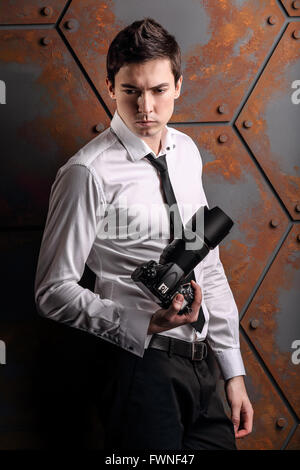 Photographer in studio Stock Photo - Alamy