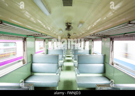 Empty seat inside locomotive train wagon Stock Photo - Alamy