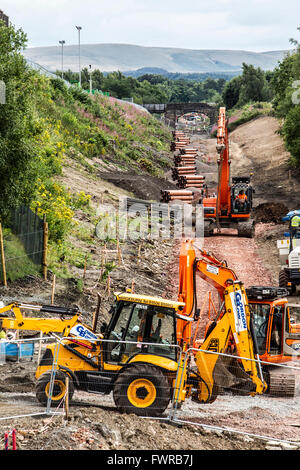 Diggers in use during construction of the Borders Railway , Scotland ...