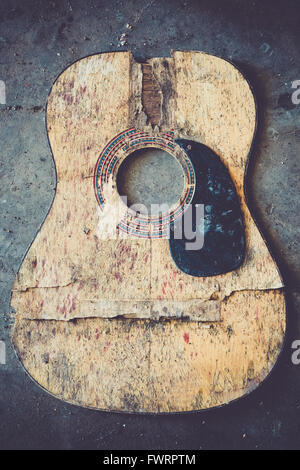 Broken acoustic guitar Stock Photo - Alamy