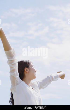 Young Asian women stretching arms exercise warm up fitness wellness ...