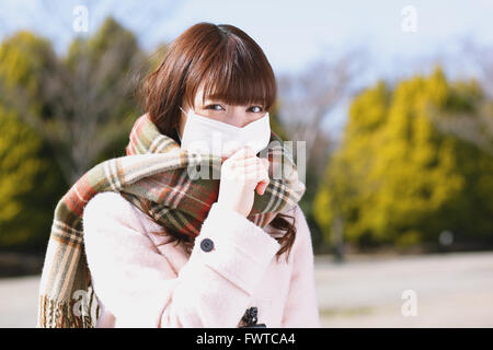 Young woman feeling sick, coughing, have covid-19 symptoms Stock Photo ...