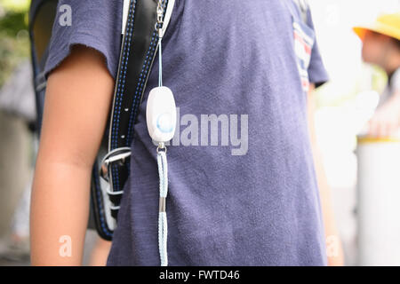 Japanese kid with crime prevention buzzer Stock Photo - Alamy