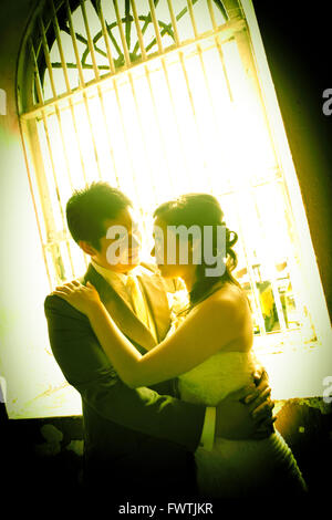 Bride and groom look into each other eyes smiling. Portrait Stock Photo ...