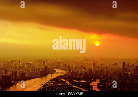 Guangzhou over a beautiful sunset at dusk Stock Photo - Alamy