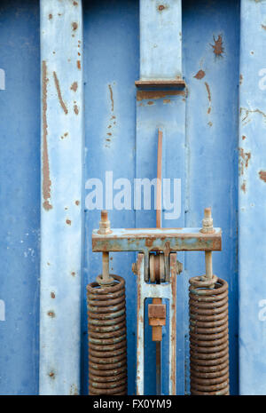 Blue background - rusty container Stock Photo - Alamy