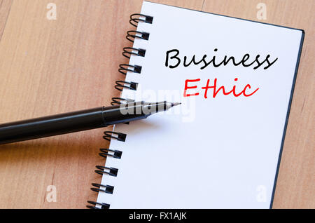 Business ethic write on notebook Stock Photo - Alamy