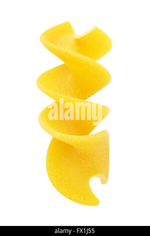 Uncooked Fusilli Pasta Lying on White Plate on Black Background. Raw ...