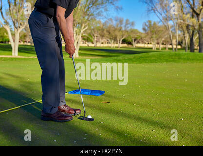 senior retired man with irons and putter on golf course Stock Photo - Alamy