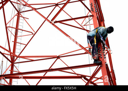 Construction of mobile telecoms mast in Uganda, Africa Stock Photo - Alamy