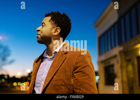 African-american businessman standing in conference room with tablet ...