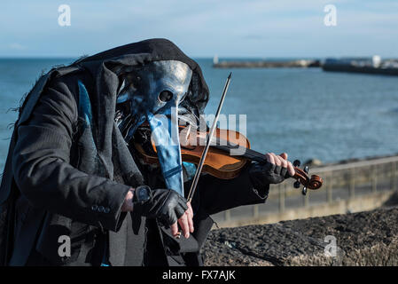 A masked guiser Stock Photo - Alamy