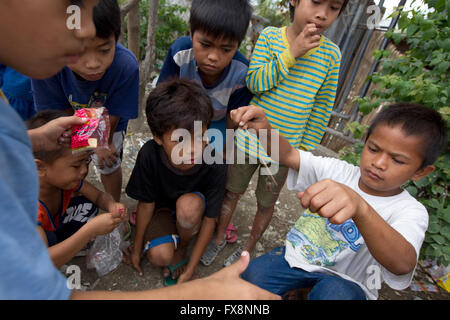 Filipino children participating in a game of spider fighting Stock ...